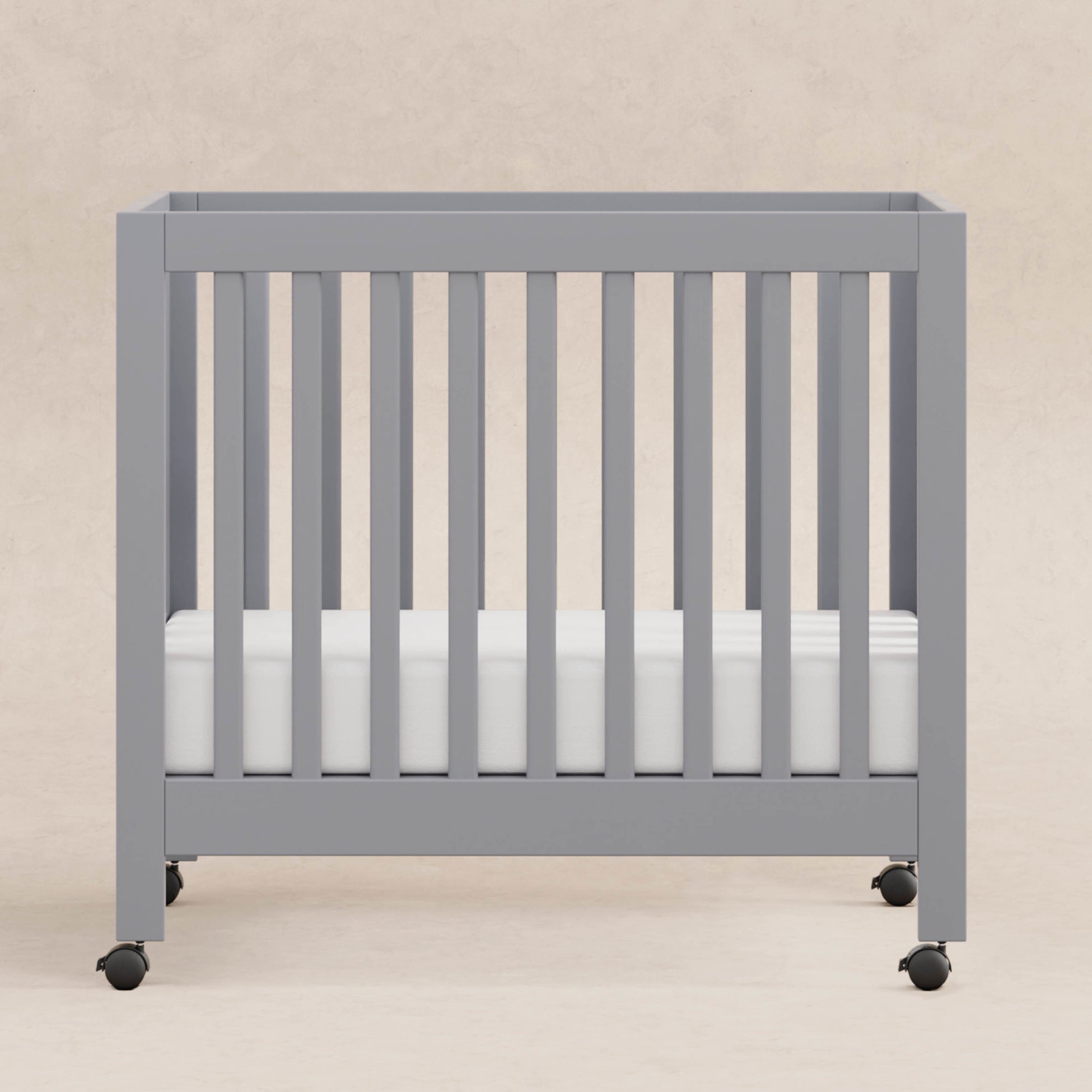 Origami Portable Mini Crib With Wheels | Babyletto